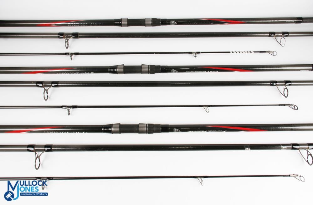 A collection of beach rods as follows: Shimano Force Master, Surf 450 ...