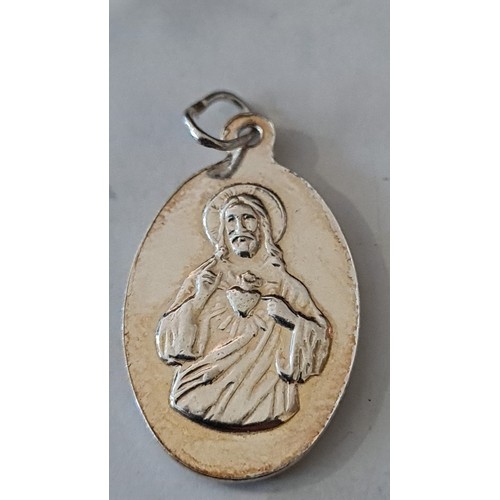 Silver religious pendant