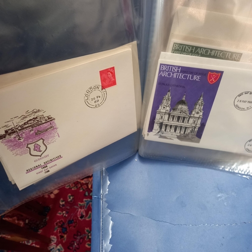 Folder of British First Day Cover Stamps and a folder of A4 ...