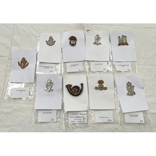 CAP BADGES TO INCLUDE CARLOW REGIMENT BUGEL BADGE, 6TH INNISKILLING ...