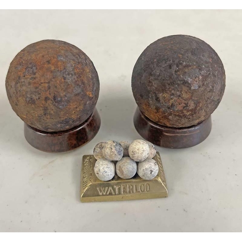 TWO NAPOLEONIC STYLE 2LB CANNON BALLS ON STANDS ALONG WITH LEAD MUSKET ...