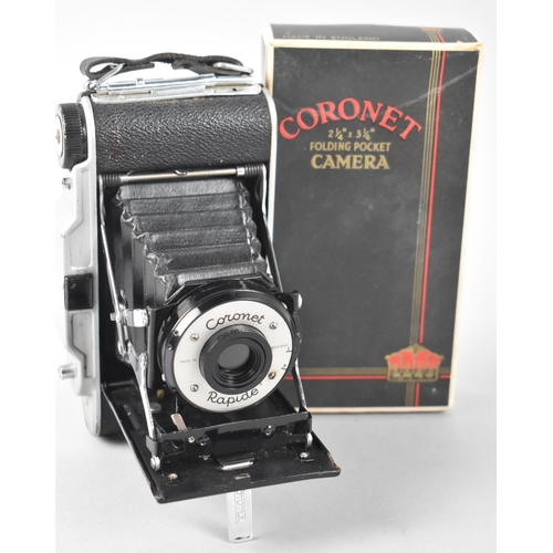 A Coronet Folding Pocket Camera in Original Cardboard Box