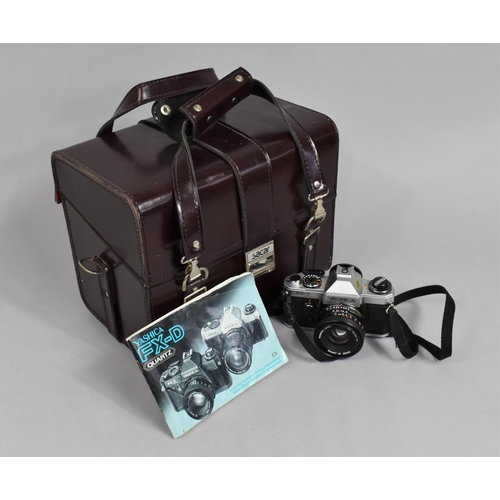 A Yashica FX-D Quartz 50mm Camera with Accessories to include Photax ...