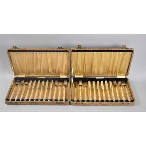 A Pair of Boxed Sets of Six Silver Plated Fruit Knives and Forks by the ...