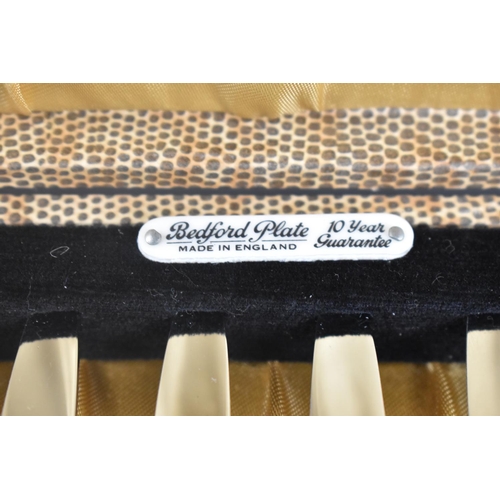 A Pair of Boxed Sets of Six Silver Plated Fruit Knives and Forks by the ...