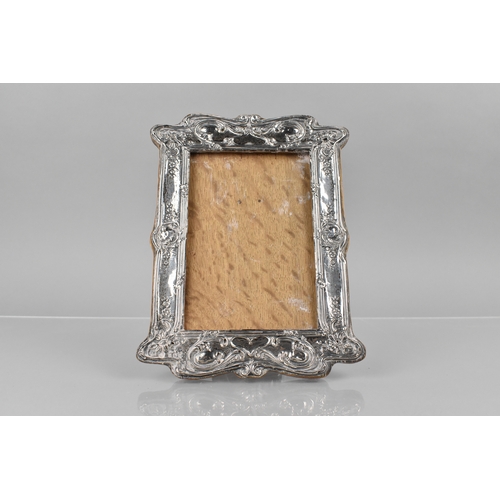 An Edward VII Silver Photo Frames by Robert Pringle & Sons Decorated in ...