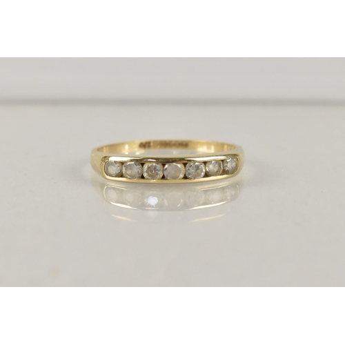 A 9ct Gold and Cz Dress Ring, Seven Round Cut Stones Channel Set ...