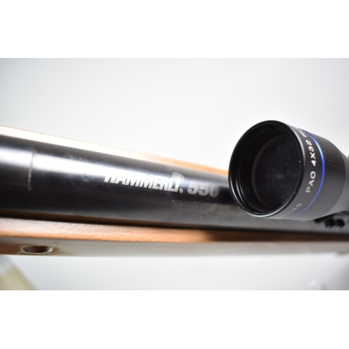A Modern Hammerli 550 .22 Calibre Air Rifle with PAO Topaz Rifle Scope ...