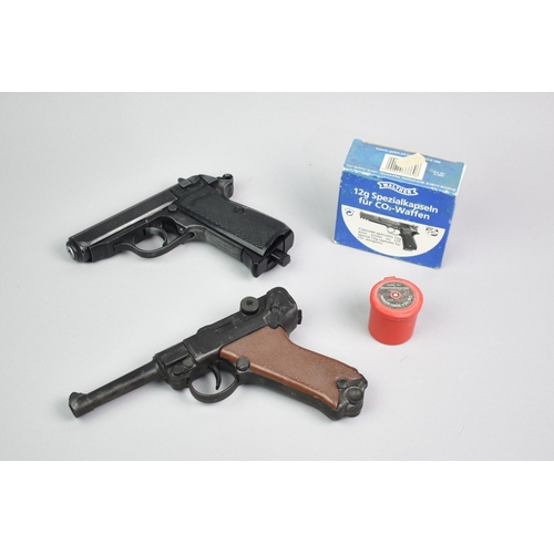 A Toy Luger Cap Gun together with a Walther CO2 Pistol with Capsules ...