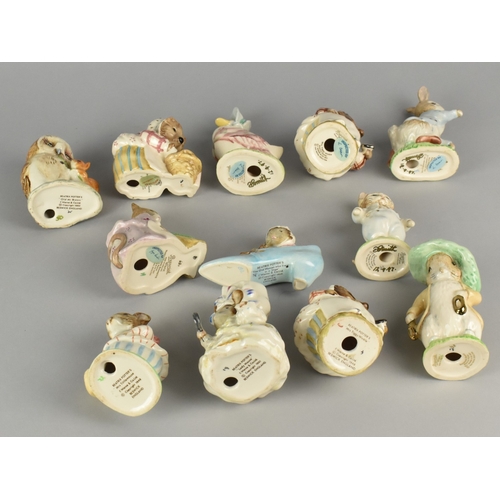 Twelve Beswick Beatrix Potter Figures Together with a Beswick Stand