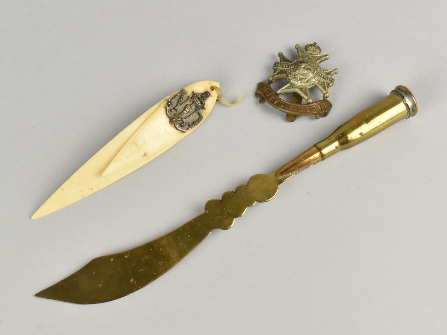 A Trench Art Scimitar Shaped Letter Opener Formed From a Spent Bullet ...