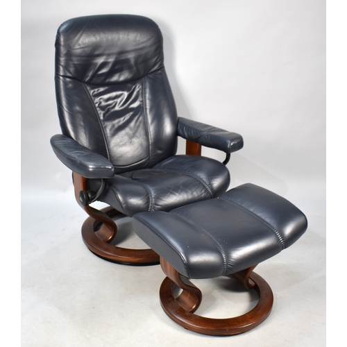 A Norwegian Ekornes Stressless Swivel Armchair with Matching Stool