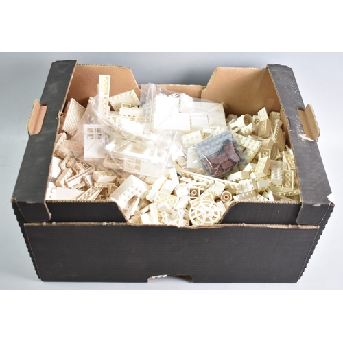 A Box Containing Large Quantity of White Lego Building Blocks