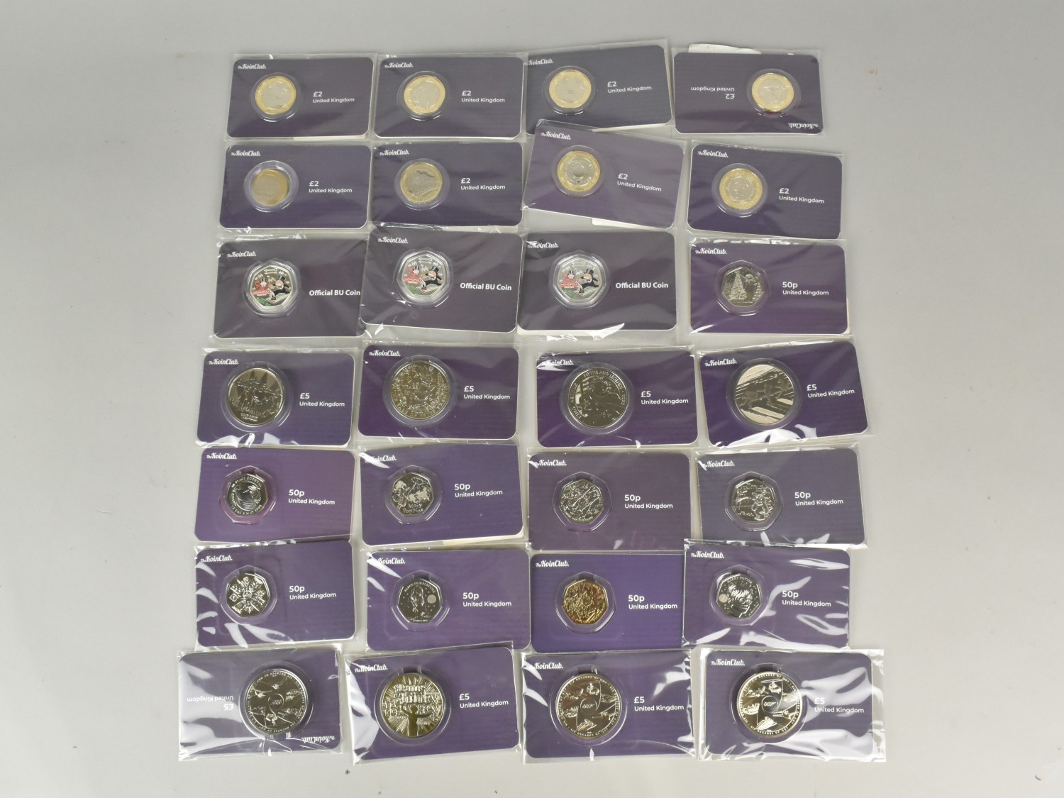 A Collection of the Koin Club Packaged Coins to Include £5, £2 and 50p ...