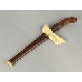 A Far Eastern Kris Dagger with Rib Bone Guard and Carved Wooden Handle ...