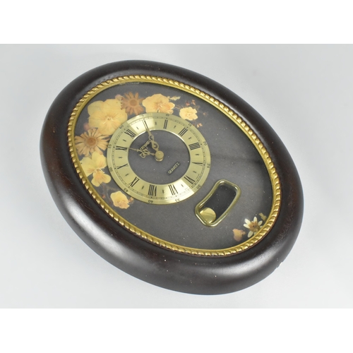 A Late 20th Century Oval Wall Clock by Metamec with Quartz Battery ...
