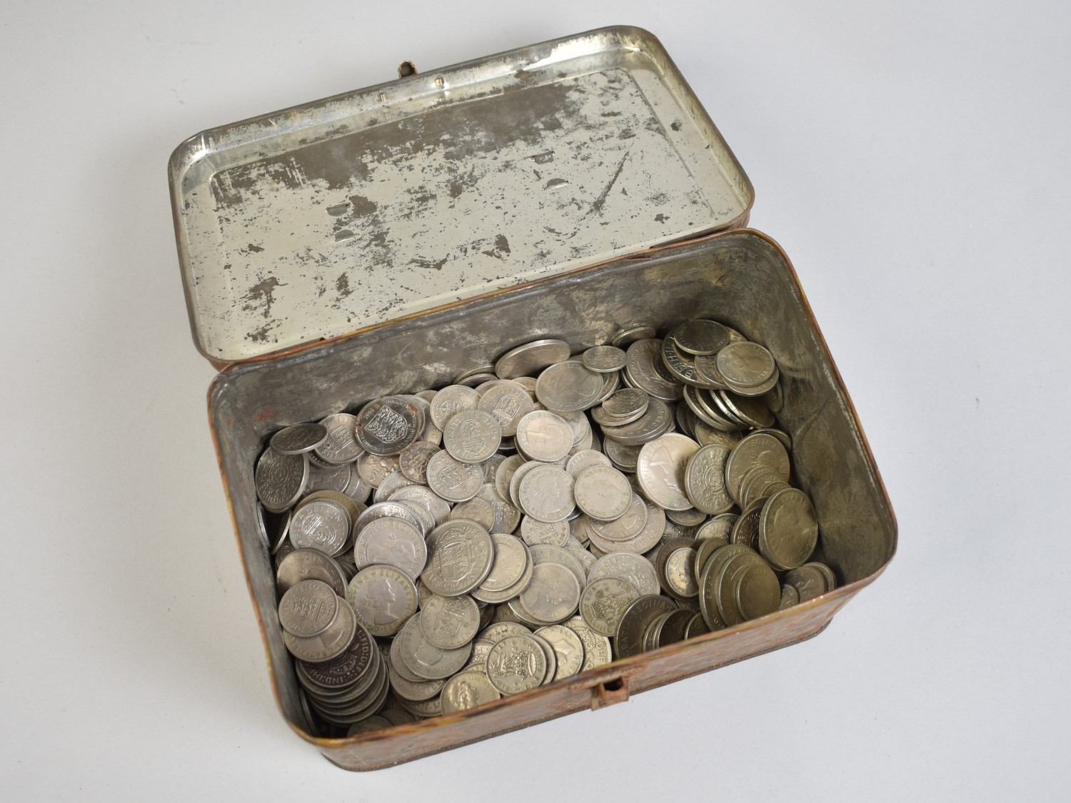 A Vintage Tin Containing British Coins and Tokens