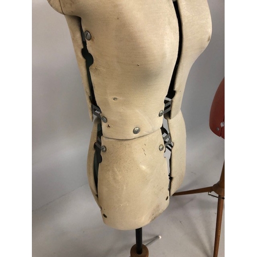 Two Mid century Dress makers body forms, one on a wooden stand the ...