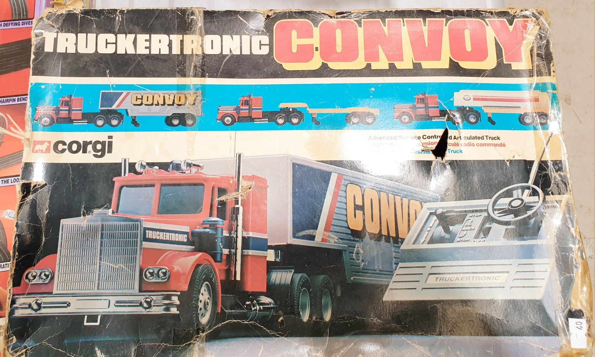 A Tomy AFX Vertigo slot car racing set together with a vintage boxed ...