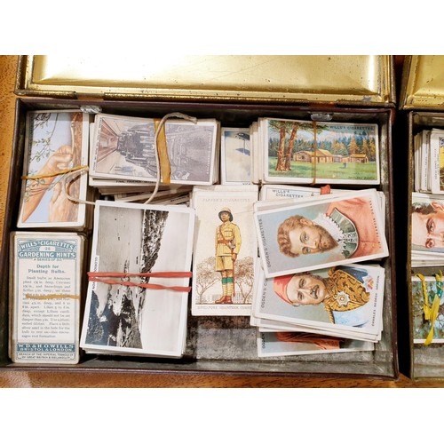 A selection of Cigarette cards. UK shipping £14.