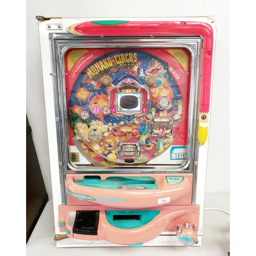 A vintage Japanese Pachinko machine, length 90cm, with transformer. No ...