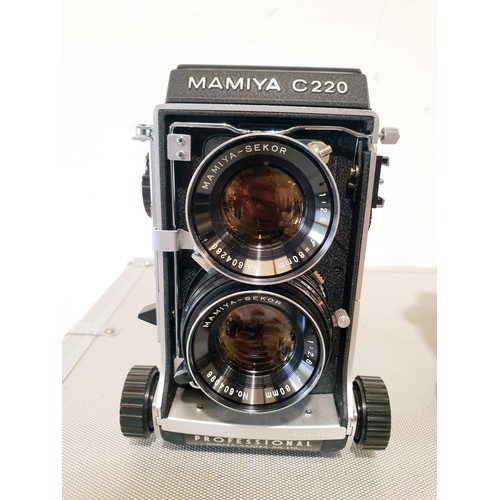 A selection of vintage Mamiya camera equipment to include: C220 and ...