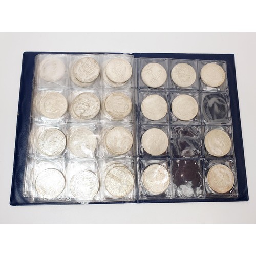 An album of reproduction coins. UK shipping £14.