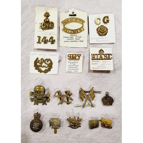 Fifteen British military cap, collar and sleeve badges including Royal ...