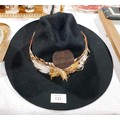A John B Stetson Stetson hat trimmed with feathers. No shipping ...