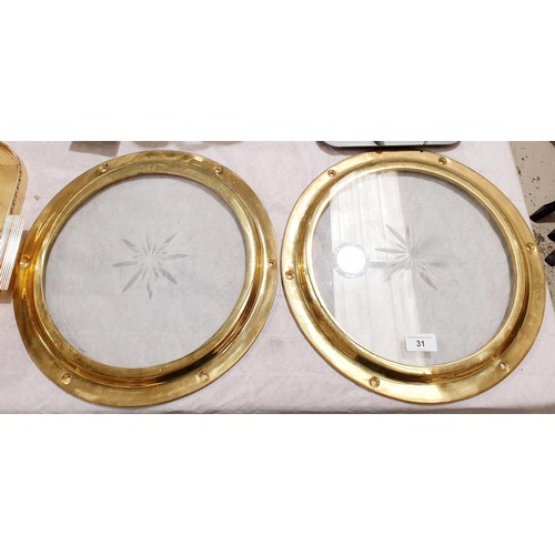 A pair of brass porthole windows with etched glass, diameter 36cm. No ...