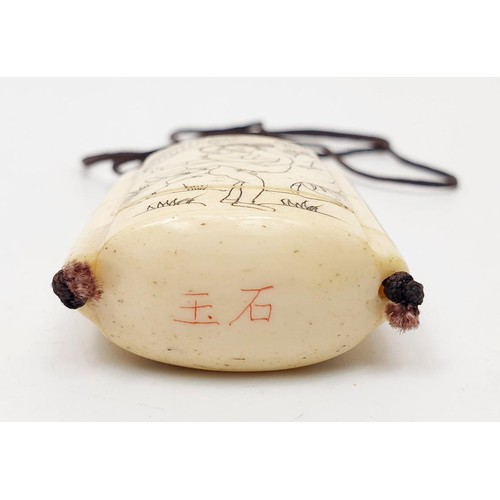 A bone Japanese erotic inro, length 5.5cm. UK shipping £14.