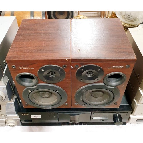 A Teac V-395CHX stereo cassette deck together with a pair of Technics ...
