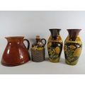 Bretby art pottery treacle glaze matching vases, jug and a bottle.
