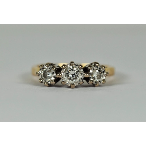 18ct gold ring set with illusion mount Triple Diamonds. The larger ...