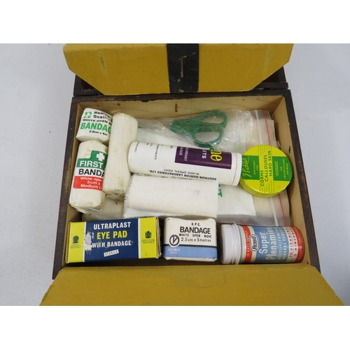 Vintage boots home medical kit in vintage wooden box.