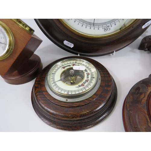 2 Barometers and 2 Barometer/thermometers (2 require repair to glass).