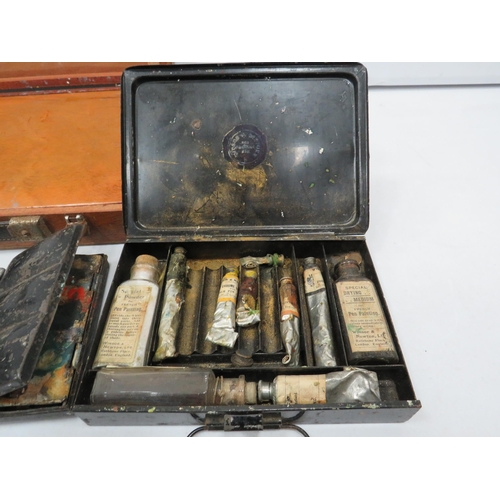 Selection of vintage artist paint sets.