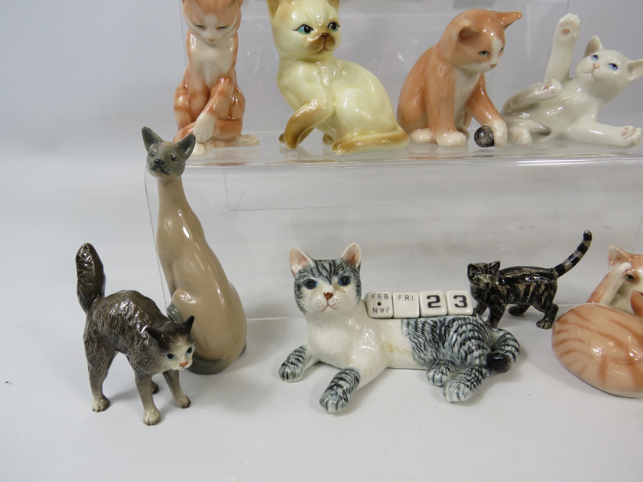 Selection of small cat figurines some by Goebel, Royal Copenhagen etc.