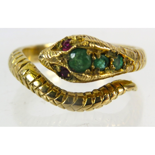 9ct gold Snake ring with ruby eyes and 3 emeralds set to the head ...