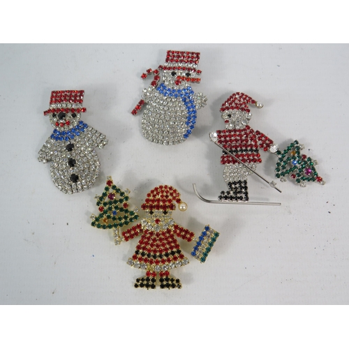 Four Butler & Wilson christmas brooches.