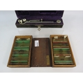 Antique planimeter and a selection of vintage microscope slides.