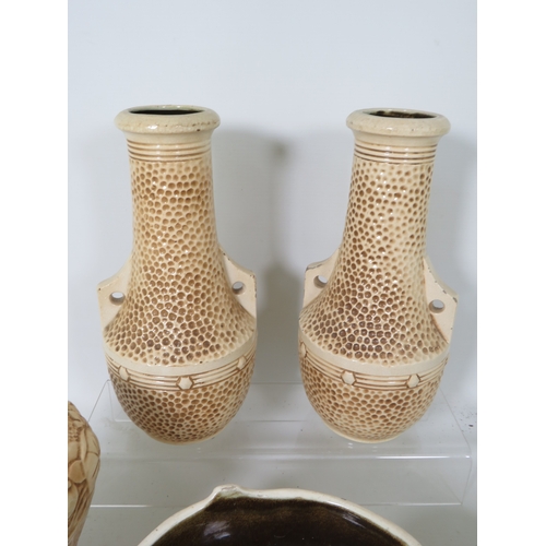 Five pieces of Bretby pottery.