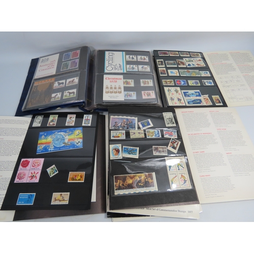 Album of GB mint stamp set plus Seven Usa mint stamp sets.