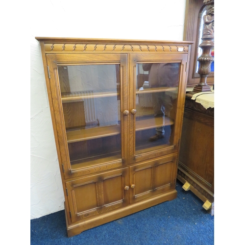 Ercol colonial style bookcase with two adjustable shelves, glazed doors ...