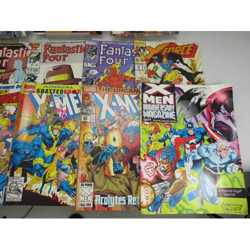26 mixed comics from Dc and Marvel, titles include X-Men, Fantastic Four, Green Lantern, etc. See ph