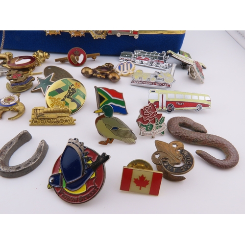 Assorted enamel and gilt badges, costume jewellery
