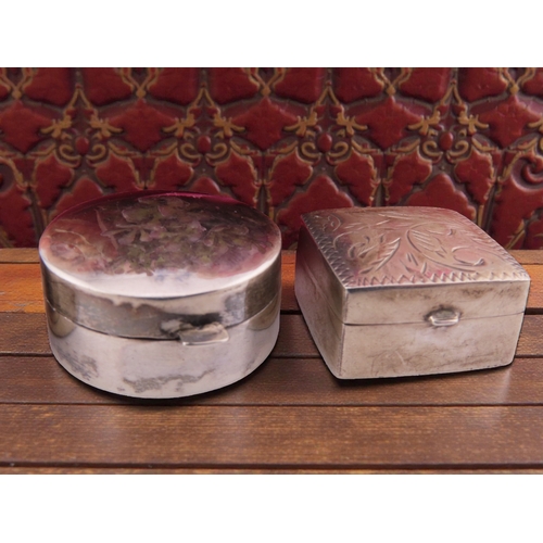 Four sterling silver pill boxes of varied form including circular and ...
