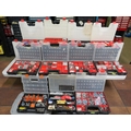 Eleven storage organizer boxes with compartments containing assorted ...