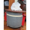 Northern Kilns pottery kiln with circular wooden top on wheeled metal stand