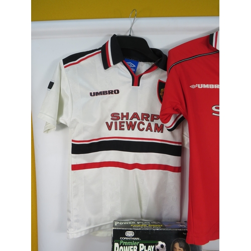 Two children's Manchester United Umbro football shirts (Sharp Viewcam ...